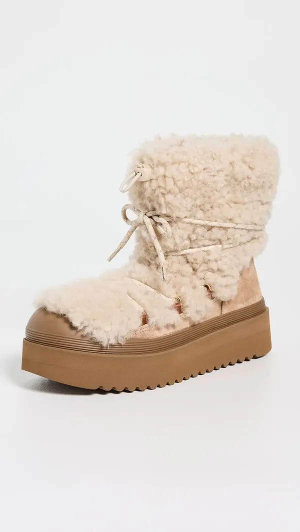 Tory Burch Mellow Shearling Lace Up Boots In Buttermilk/Light